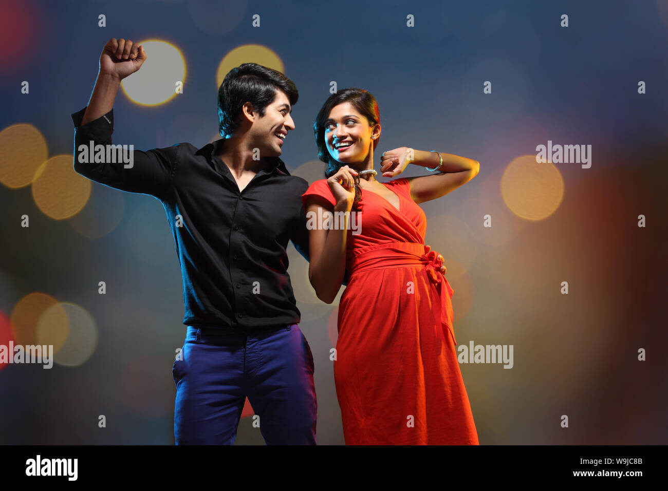 Young couple dancing in a disco hi-res stock photography and images - Alamy