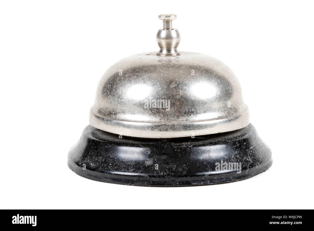 A metal reception bell isolated on a white background Stock Photo - Alamy