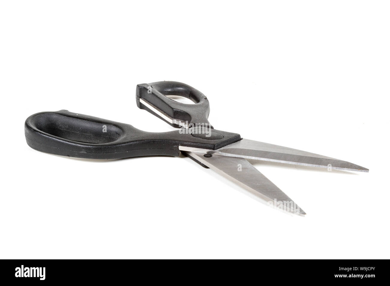A scissors isolated on a white background Stock Photo - Alamy