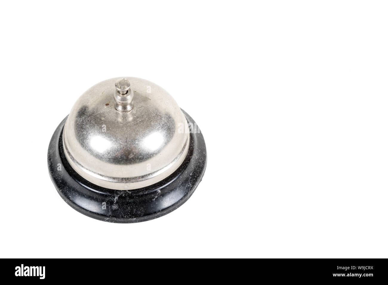 A metal reception bell isolated on a white background Stock Photo - Alamy