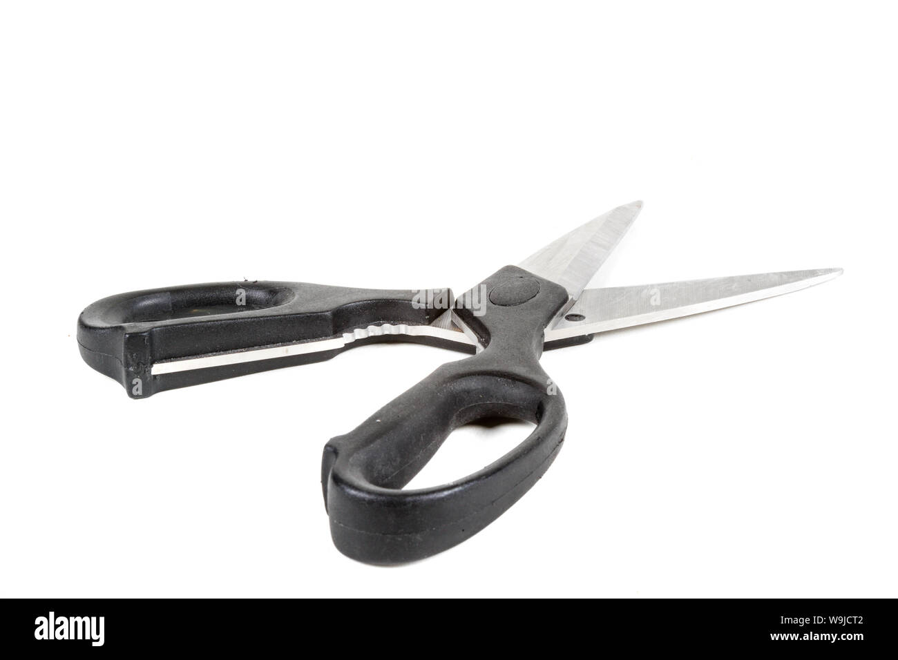 A scissors isolated on a white background Stock Photo - Alamy