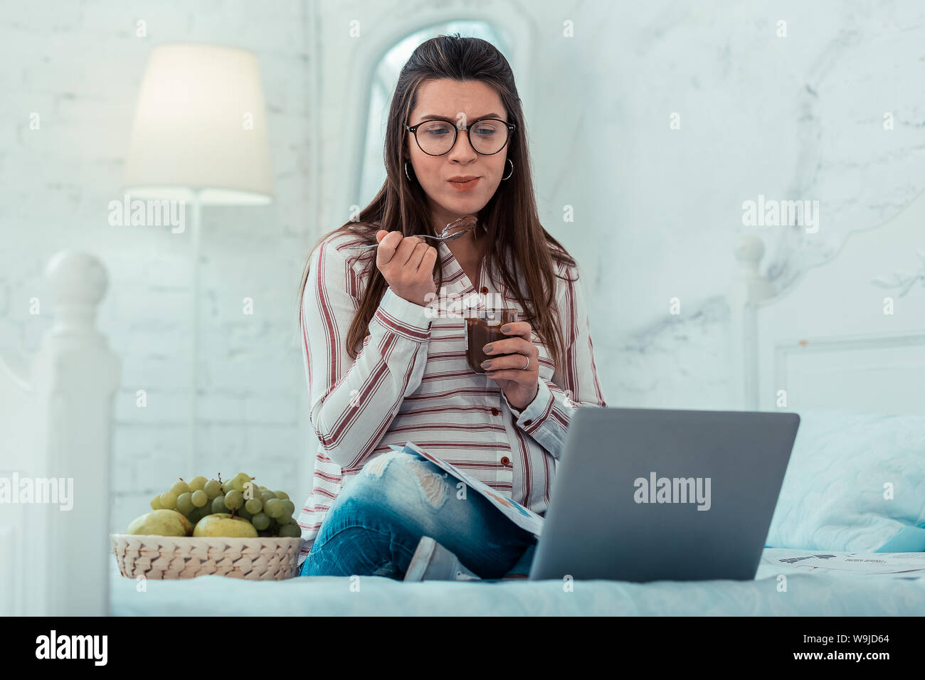 Emotional young female person expecting her baby Stock Photo - Alamy