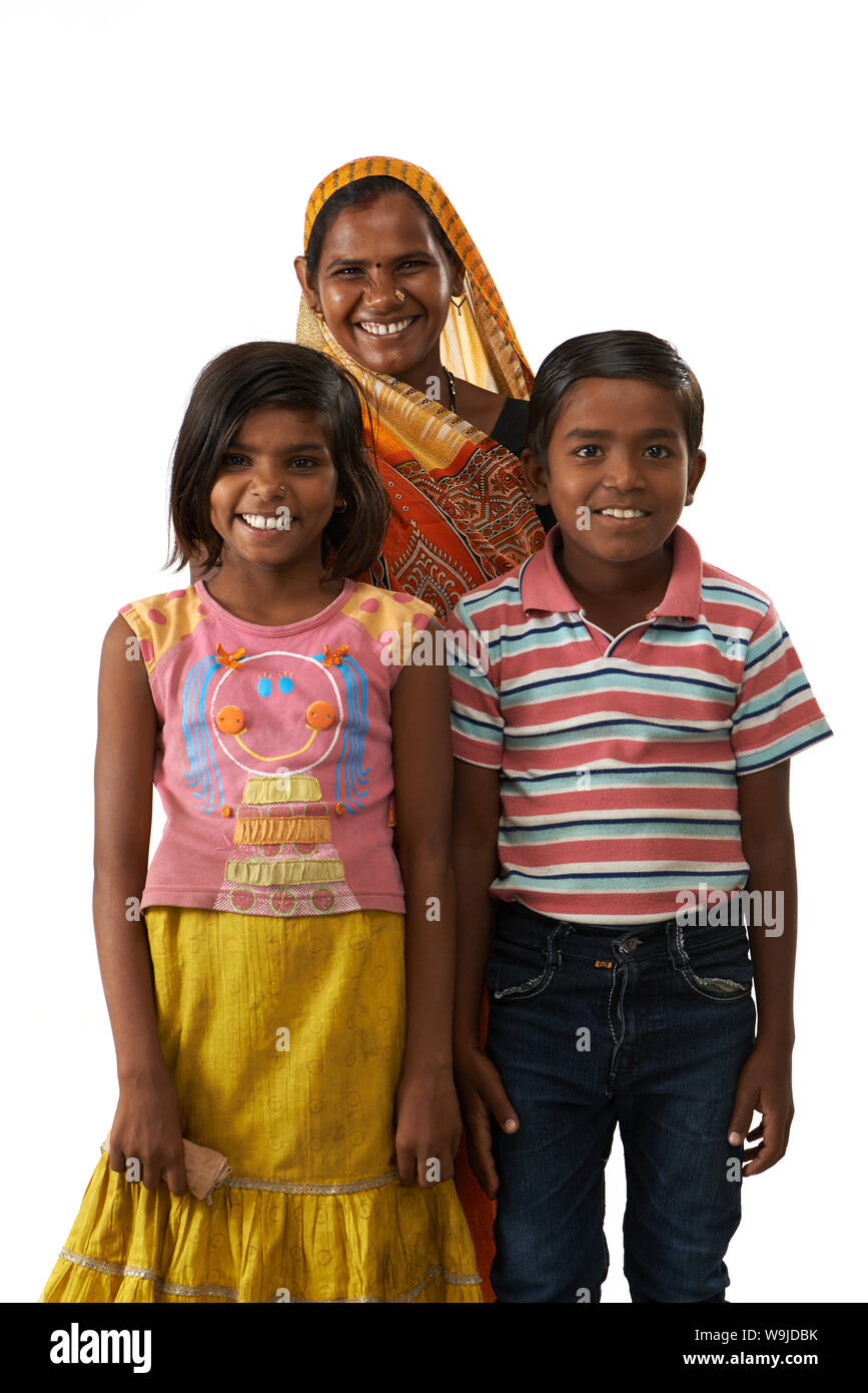 Rural family standing together and smiling Stock Photo - Alamy