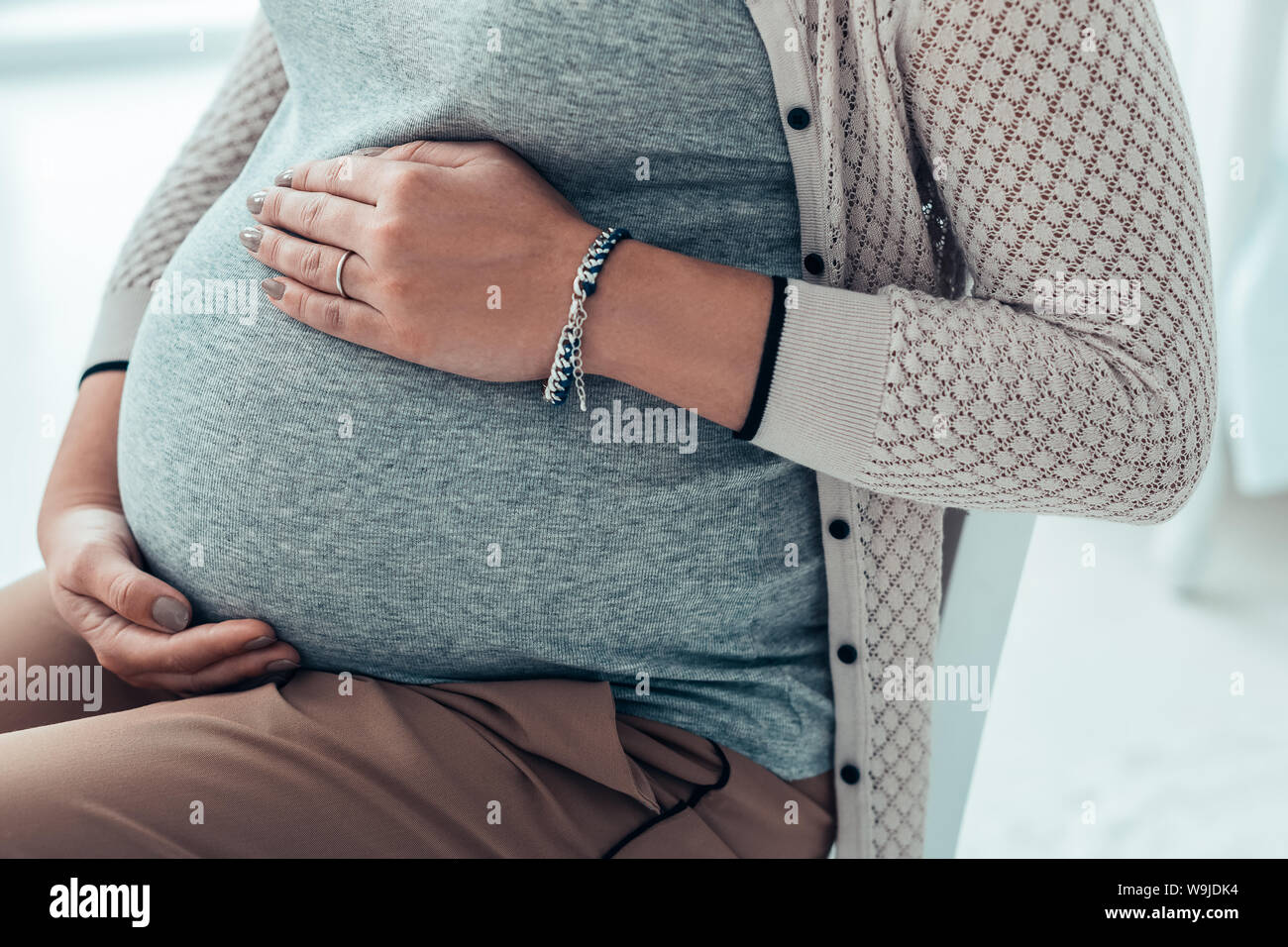 Hand mother caressing cute baby hi-res stock photography and images - Alamy