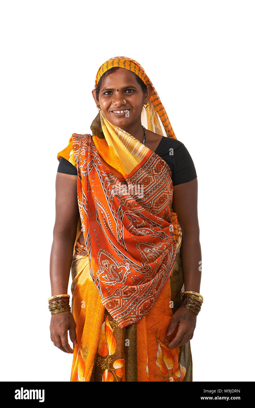 Rural woman standing and smiling Stock Photo - Alamy