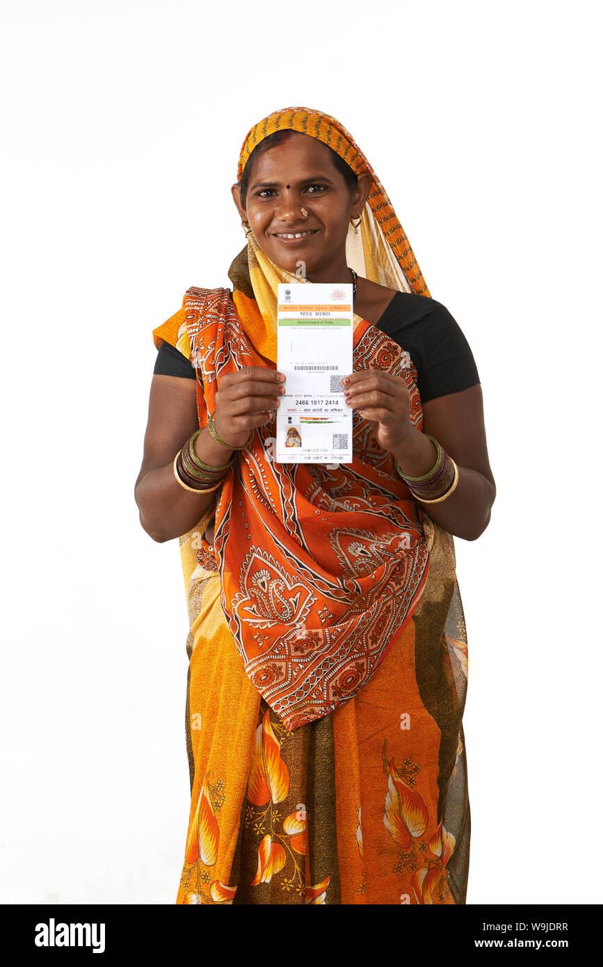 Rural woman showing an Aadhar card Stock Photo - Alamy