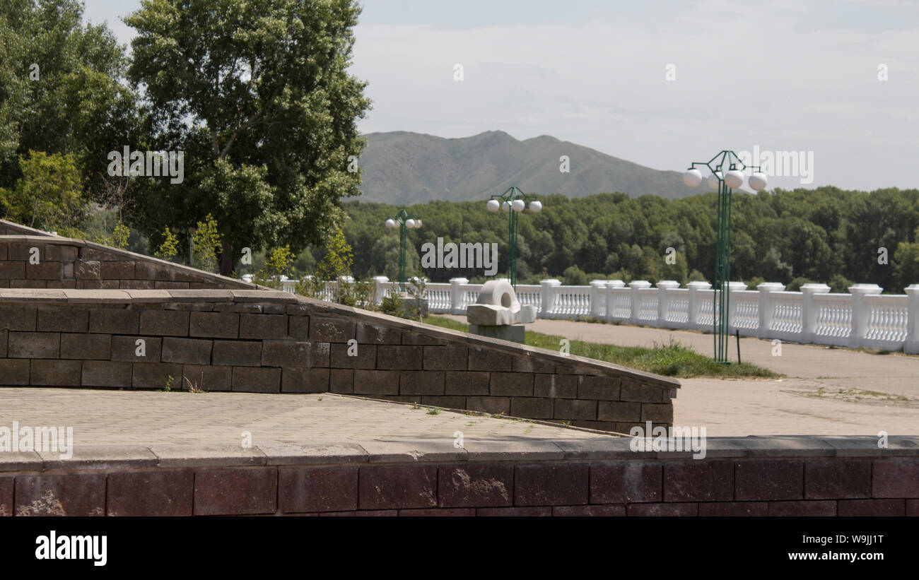 Embankment of river. City summer landscape. White parapet Stock Photo ...