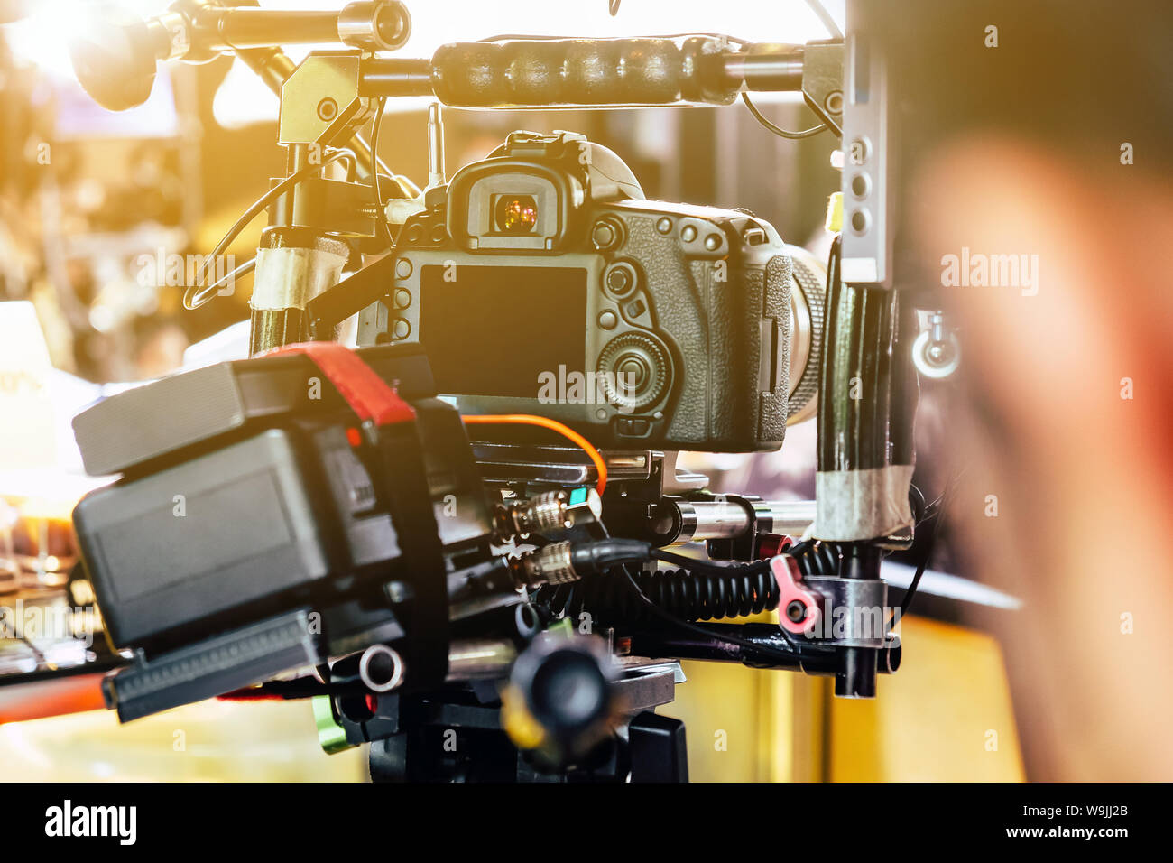 Film industry. cameraman shooting film scene with camera Stock Photo ...