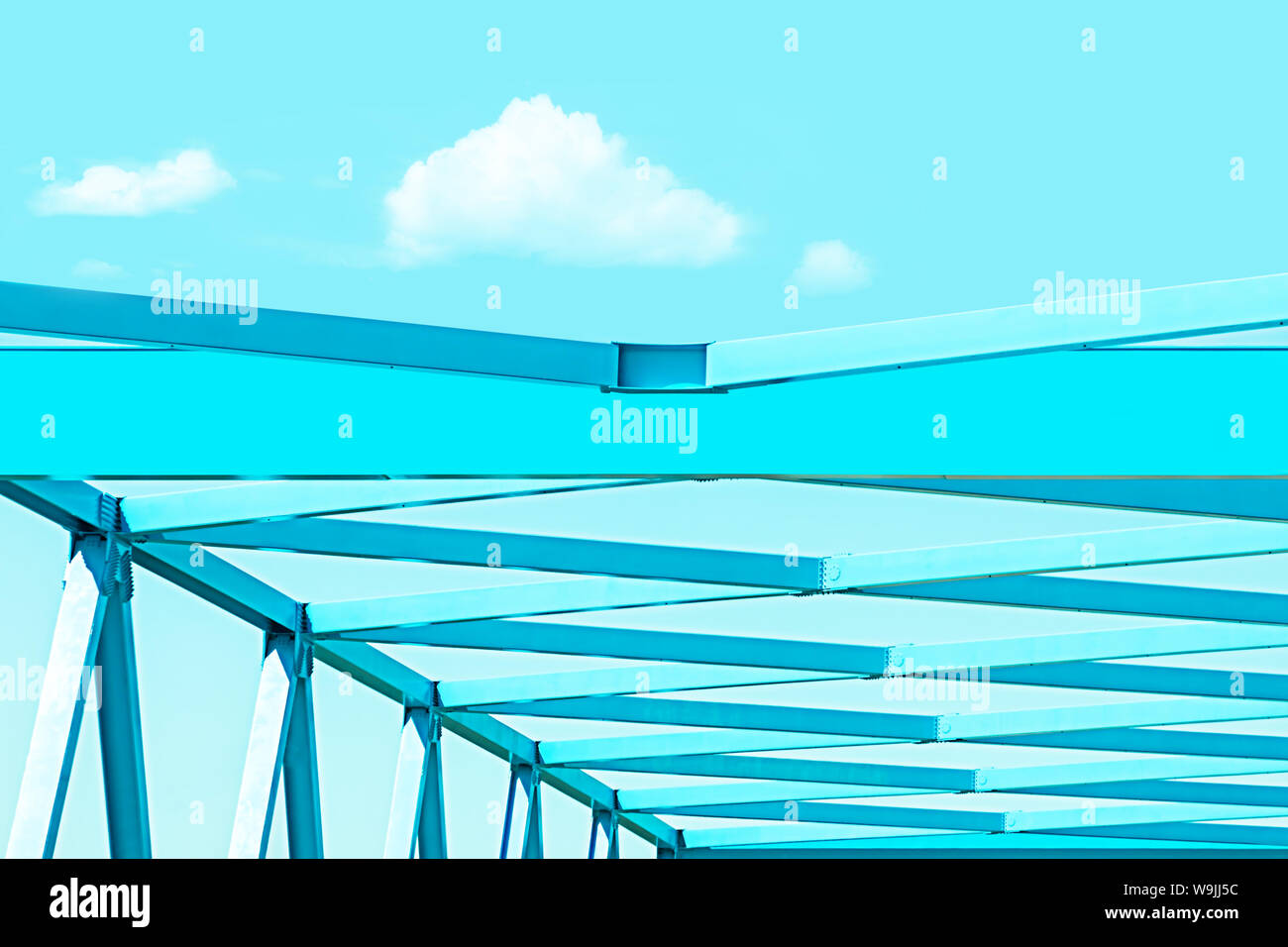 Structure of steel bridge construction with blue sky background Stock ...