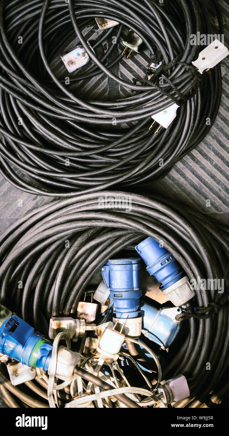 Filming Equipment, Pile of power plugs Background Stock Photo - Alamy