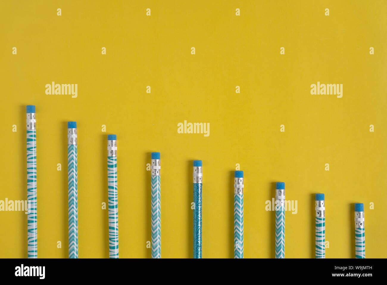 teal blue and white patterned pencils eraser end up in a descending ...