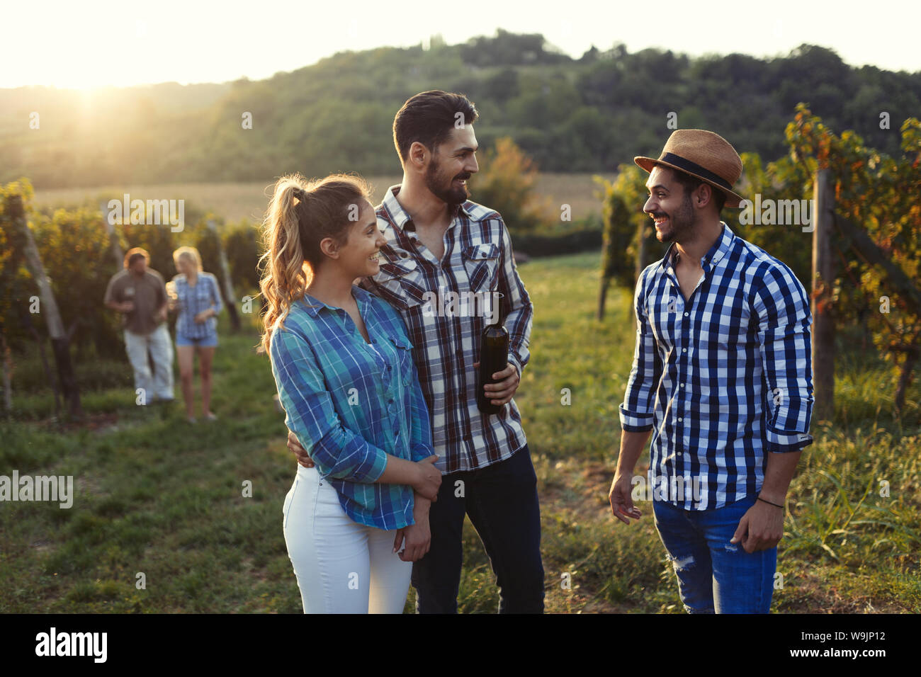 Picture of people tasting red wine in vineyard Stock Photo - Alamy