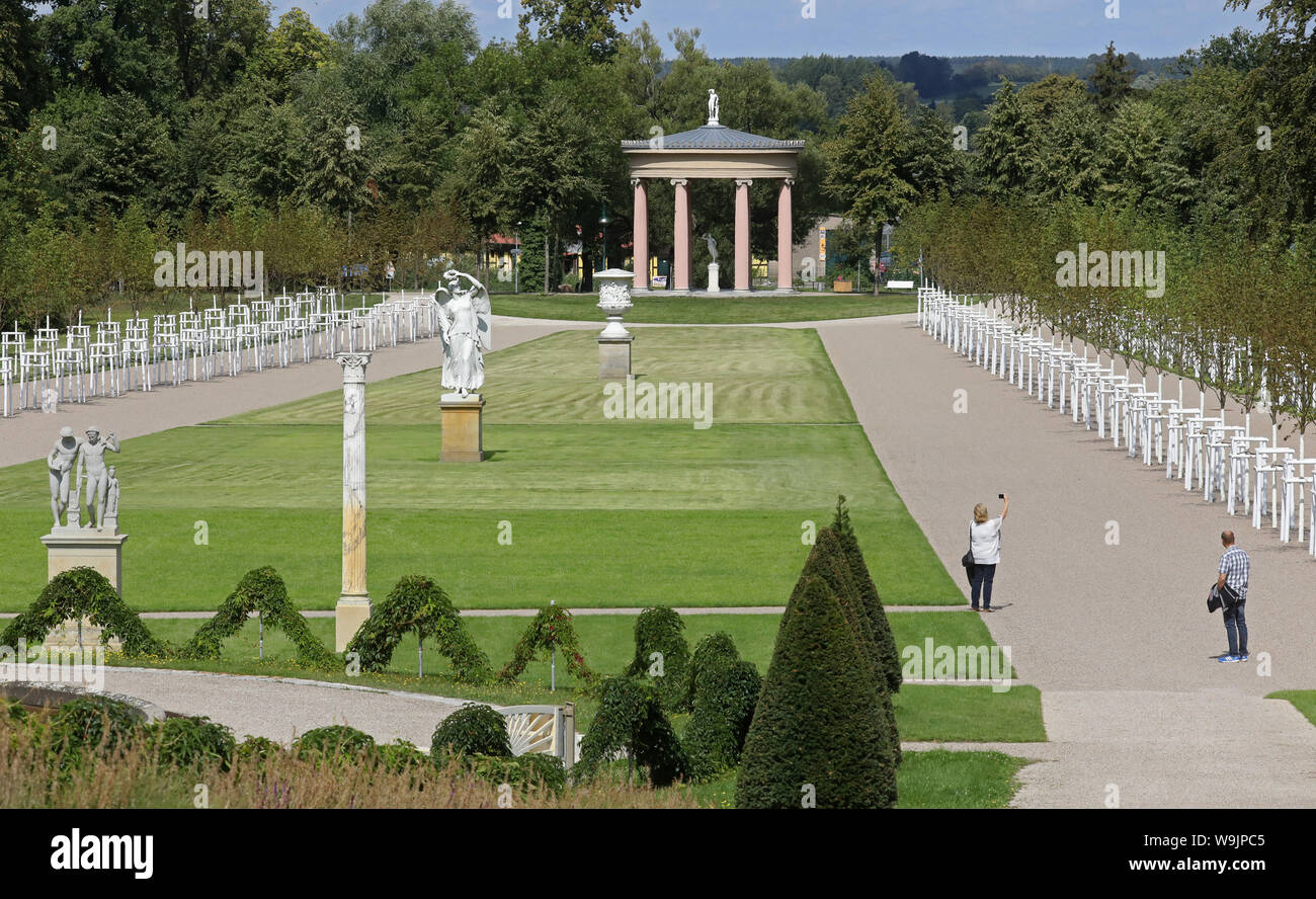 Neustrelitz, Germany. 14th Aug, 2019. The first visitors walk along a ...