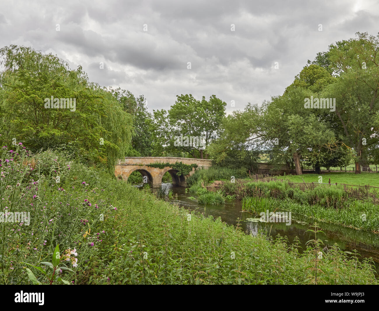The fifteenth century bridge in the village of Duddington over the ...