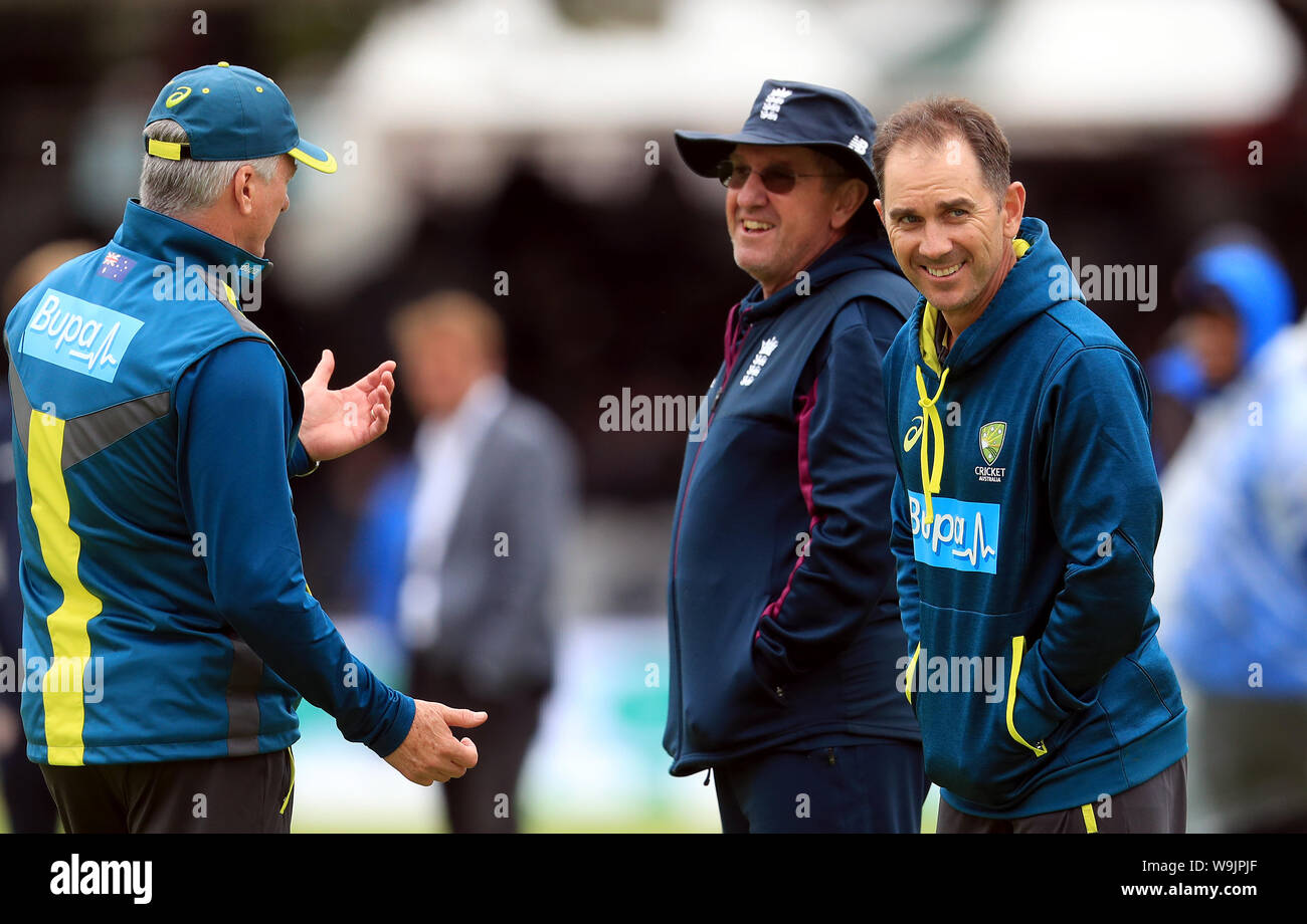 Australia coach Justin Langer (right) and Steve Waugh speak to England ...