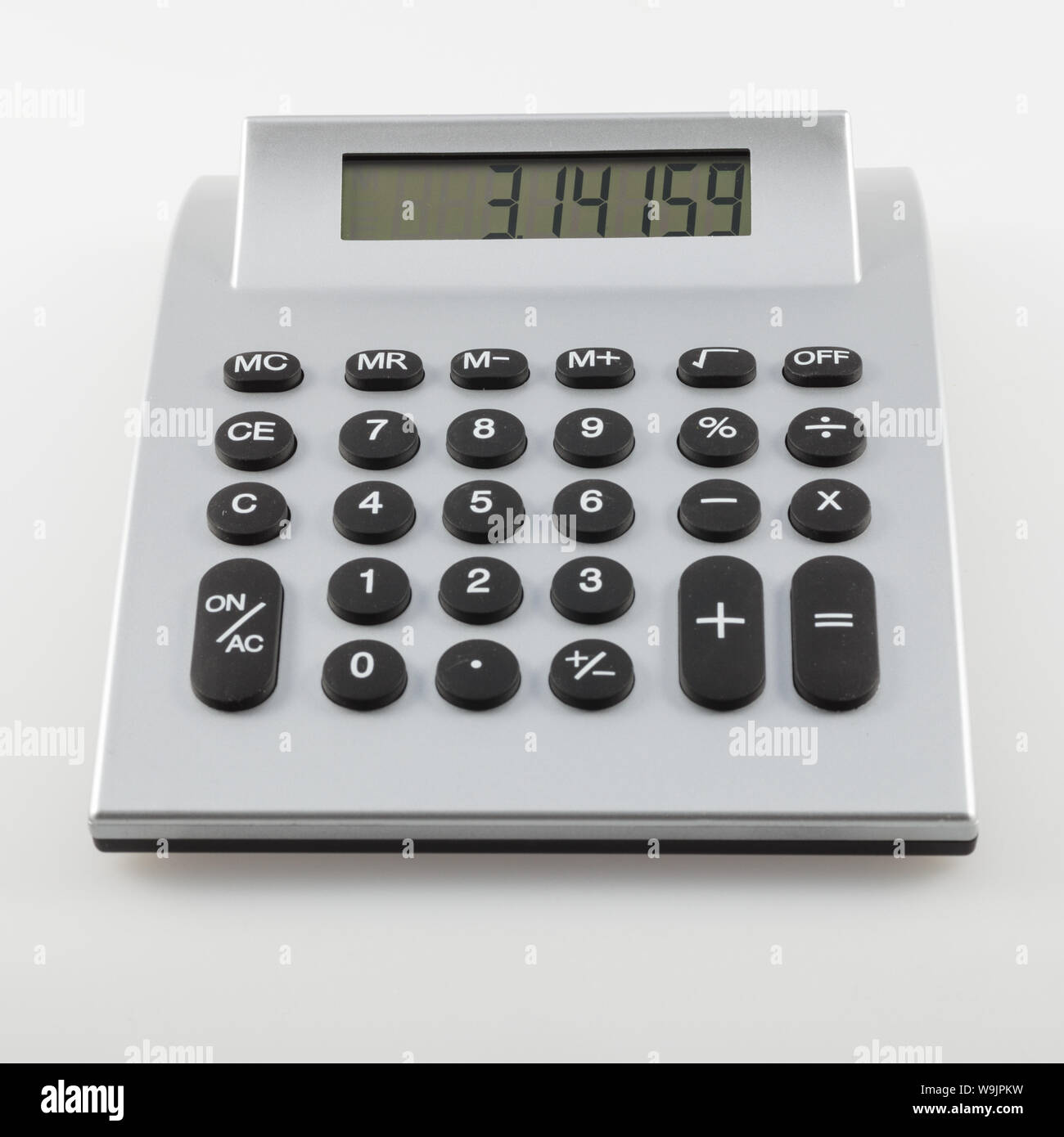 Calculator with the number of pi on its display isolated on white ...