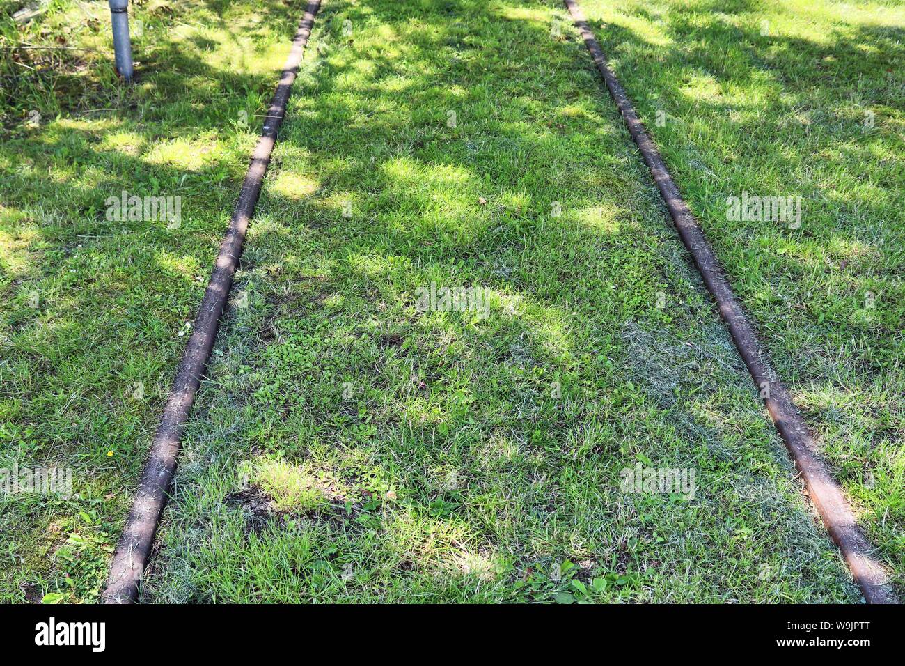 Detailed view on railroad tracks and railroad crossings in northern ...
