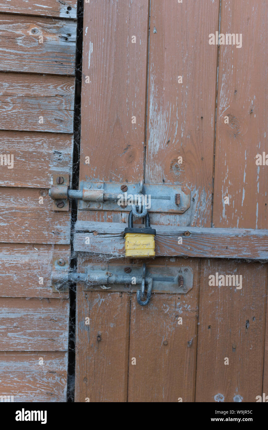 close up of locks and hinges of stables for horses in countryside Stock ...