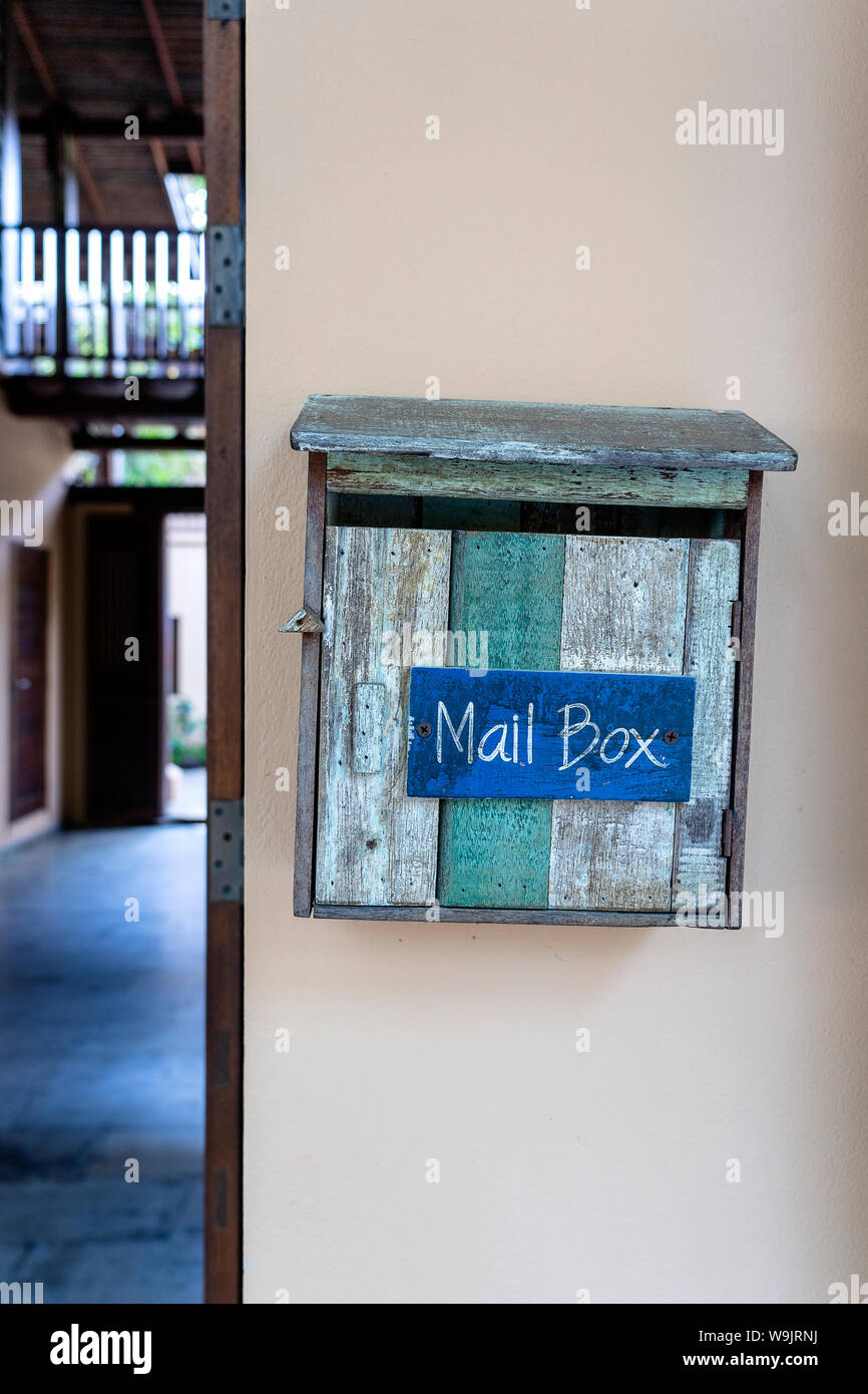 Vintage wooden mail box on wall. Thailand, close up Stock Photo - Alamy