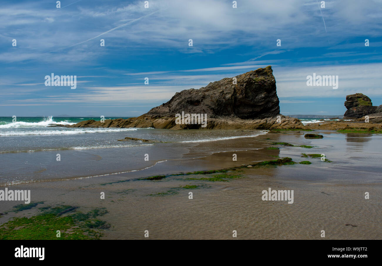 Rock formation on the Welsh coast, cloudy sky Stock Photo - Alamy