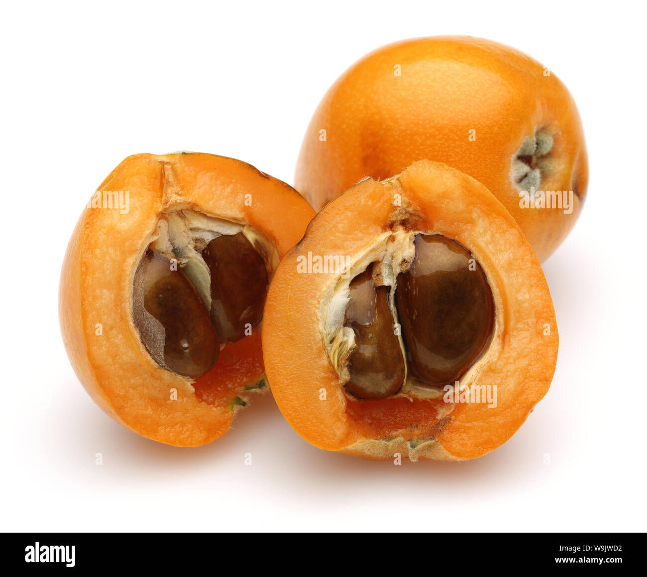 Half and whole ripe loquat fruits isolated on white background Stock ...