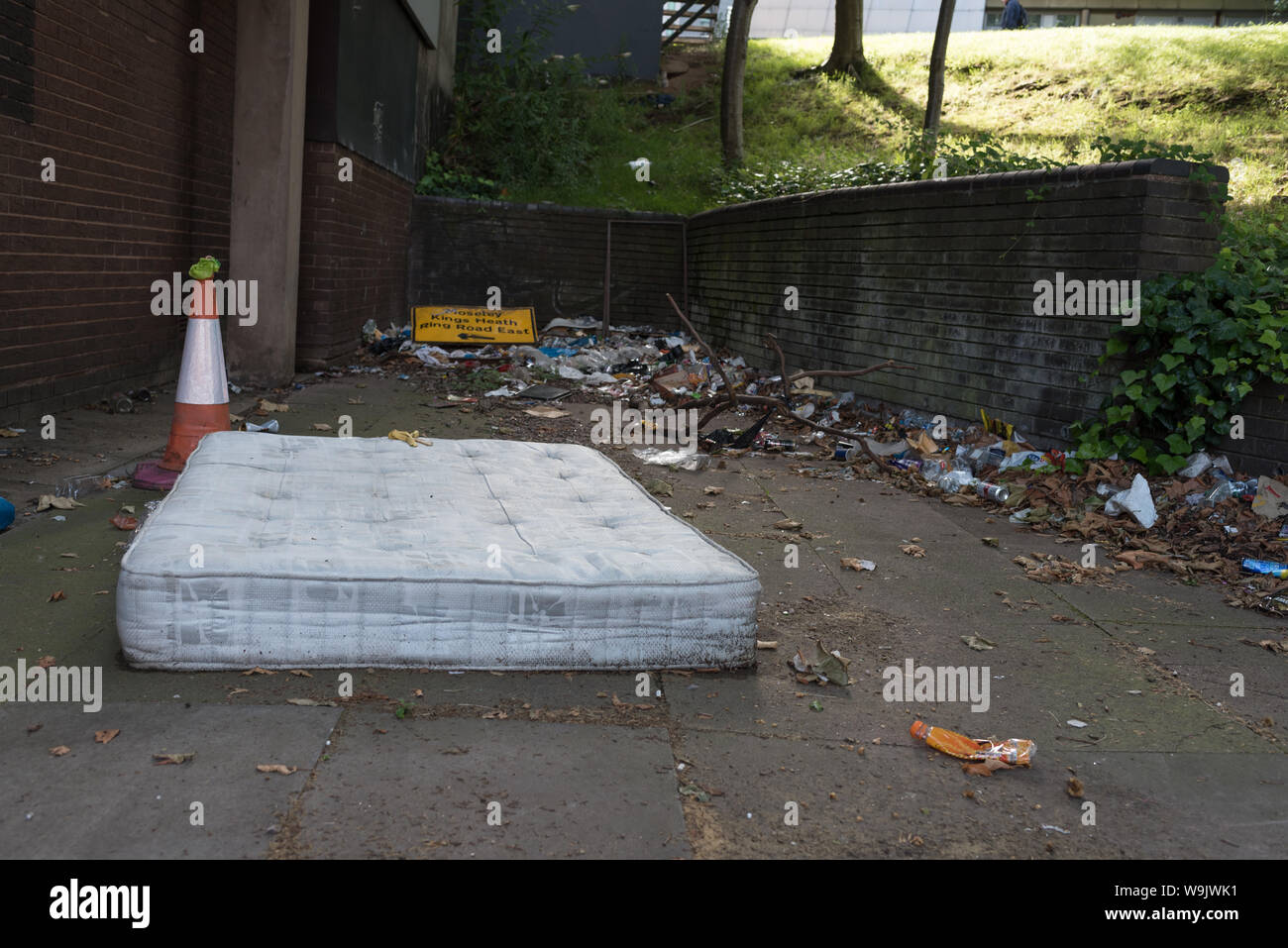 fly tipping on streets rubbish dumped anywhere Stock Photo - Alamy