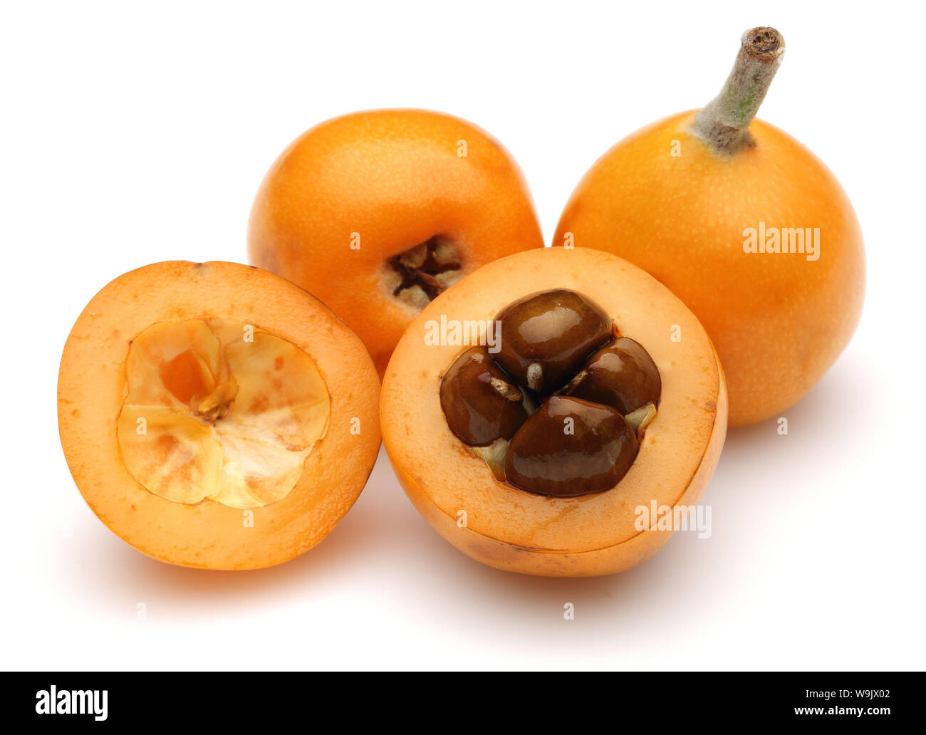 Half and whole ripe loquat fruits isolated on white background Stock ...