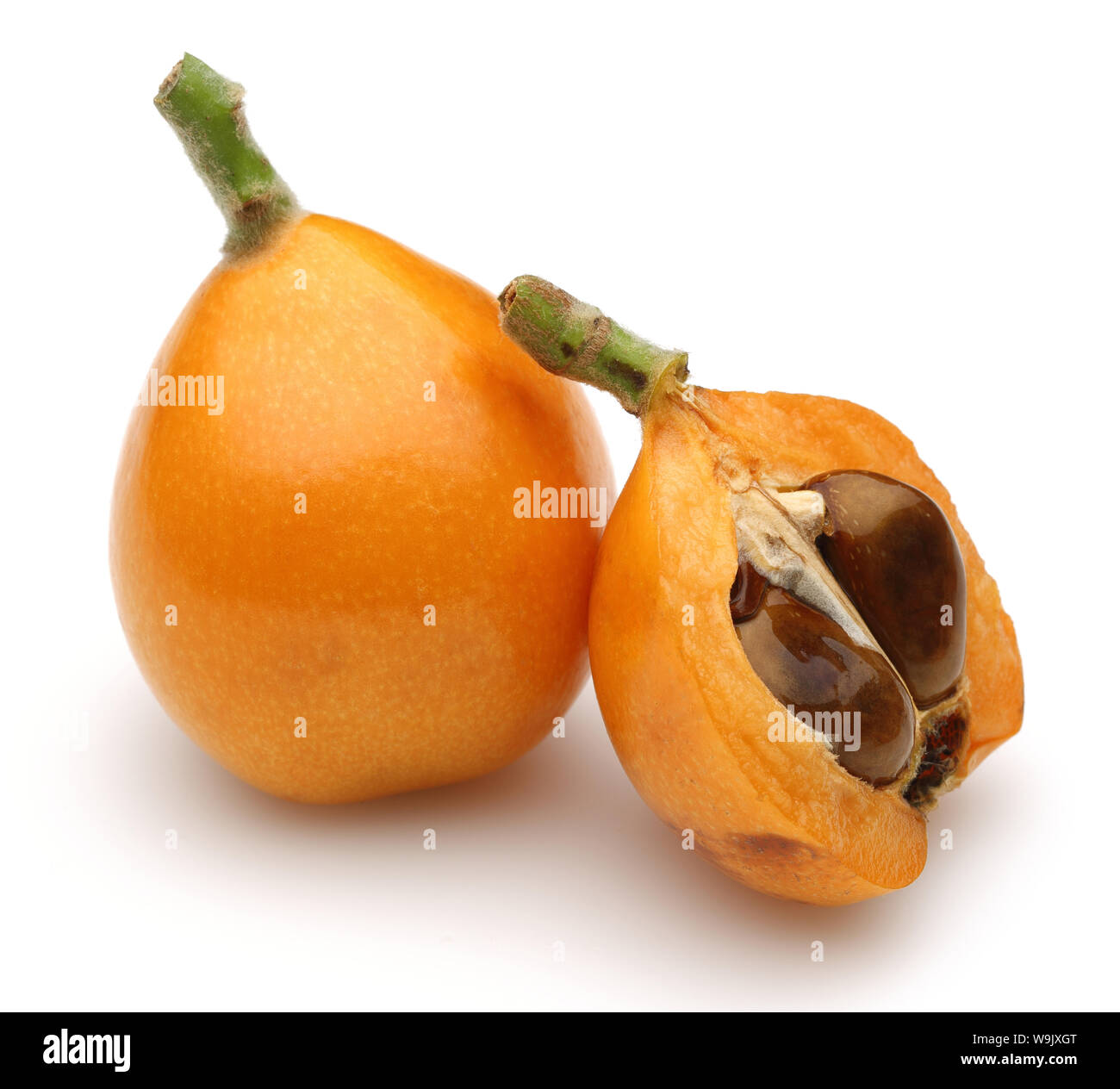 Half and whole ripe loquat fruits isolated on white background Stock ...