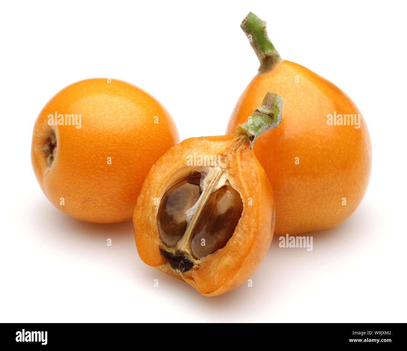 Half and whole ripe loquat fruits isolated on white background Stock ...