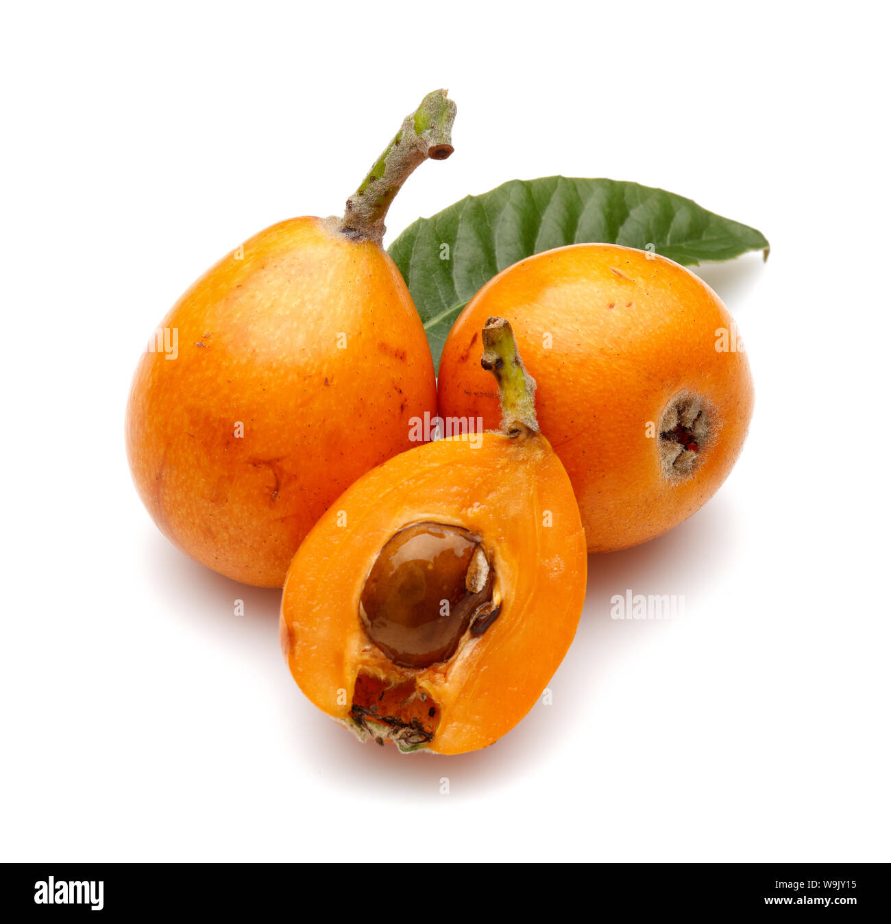 Half and whole ripe loquat fruits isolated on white background Stock ...