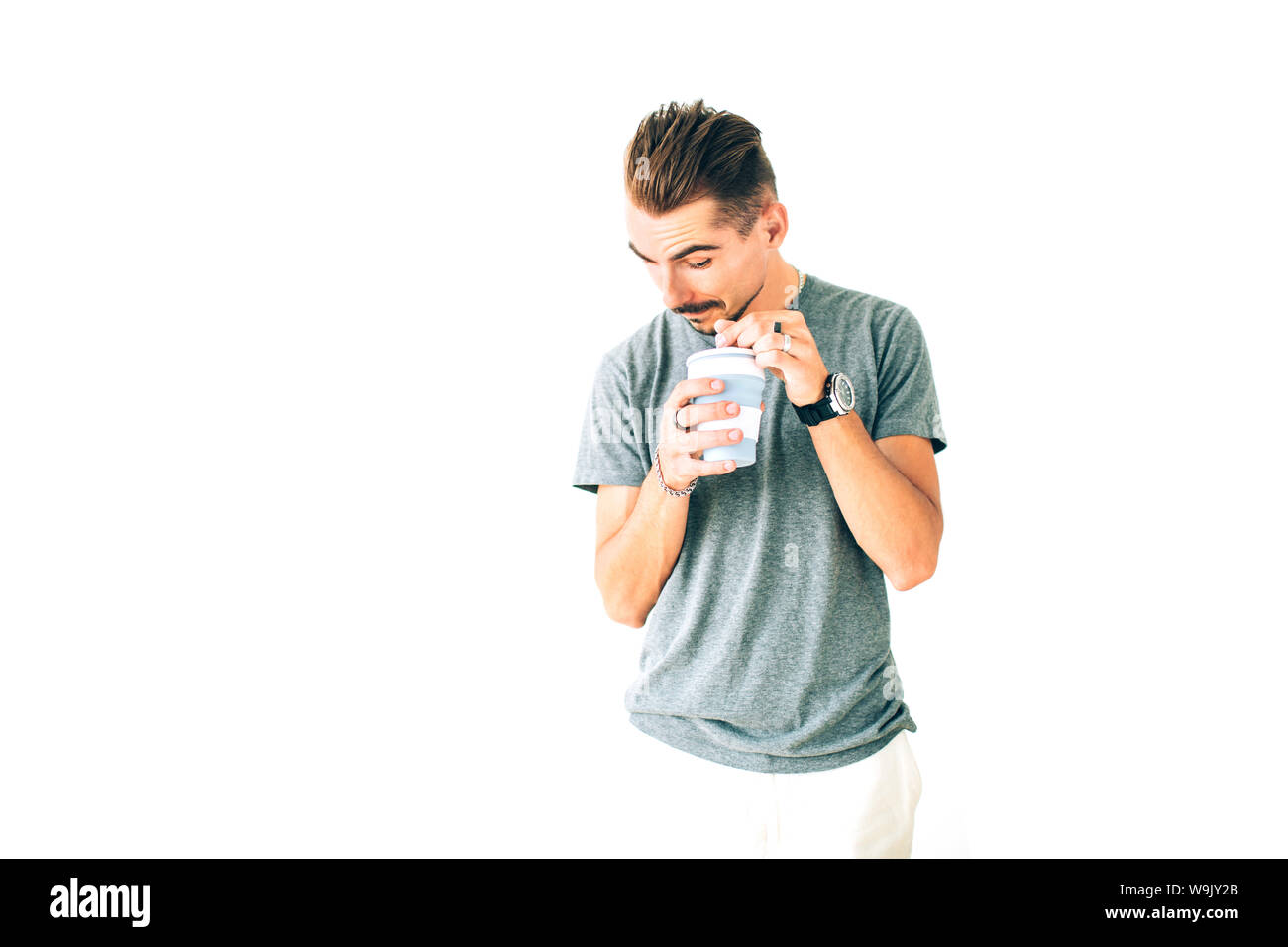 Handsome guy white cup Cut Out Stock Images & Pictures - Alamy