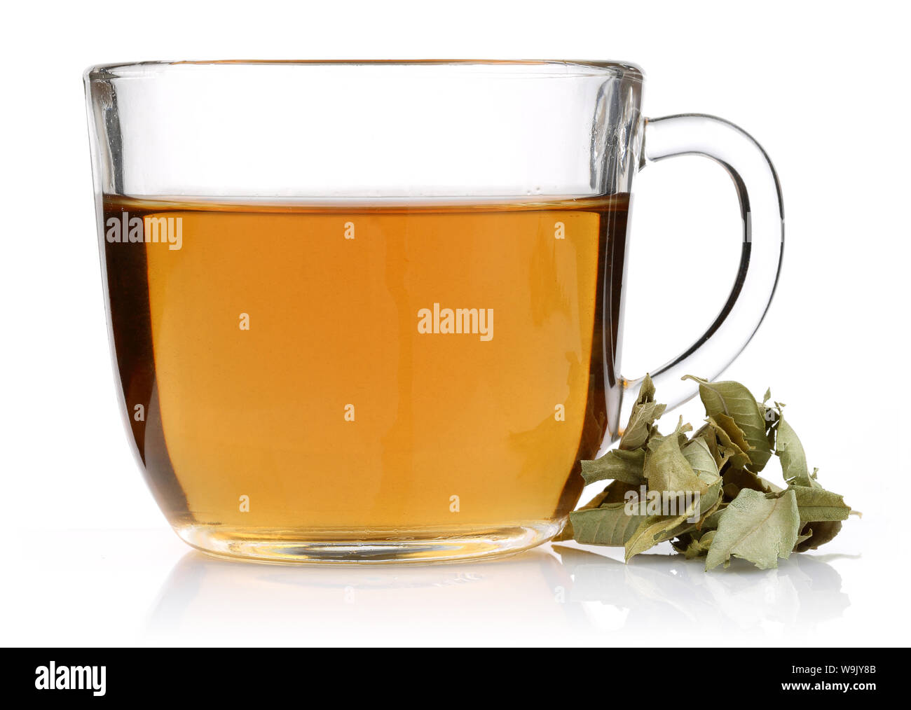 Melissa tea in a glass cup with lemon balm leaves isolated on white ...