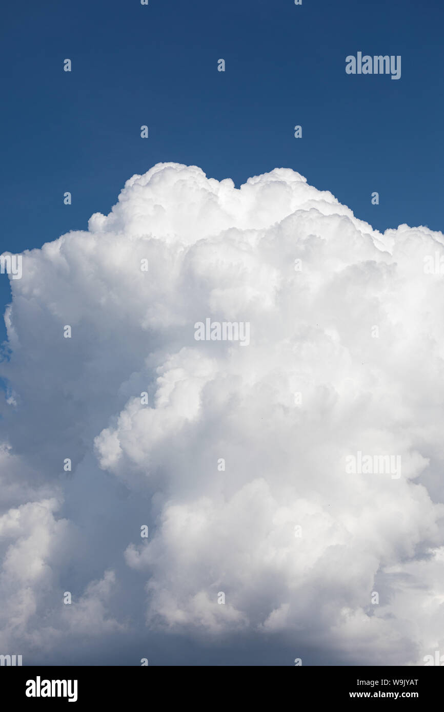 Fluffy cloud edge and blue sky Stock Photo - Alamy