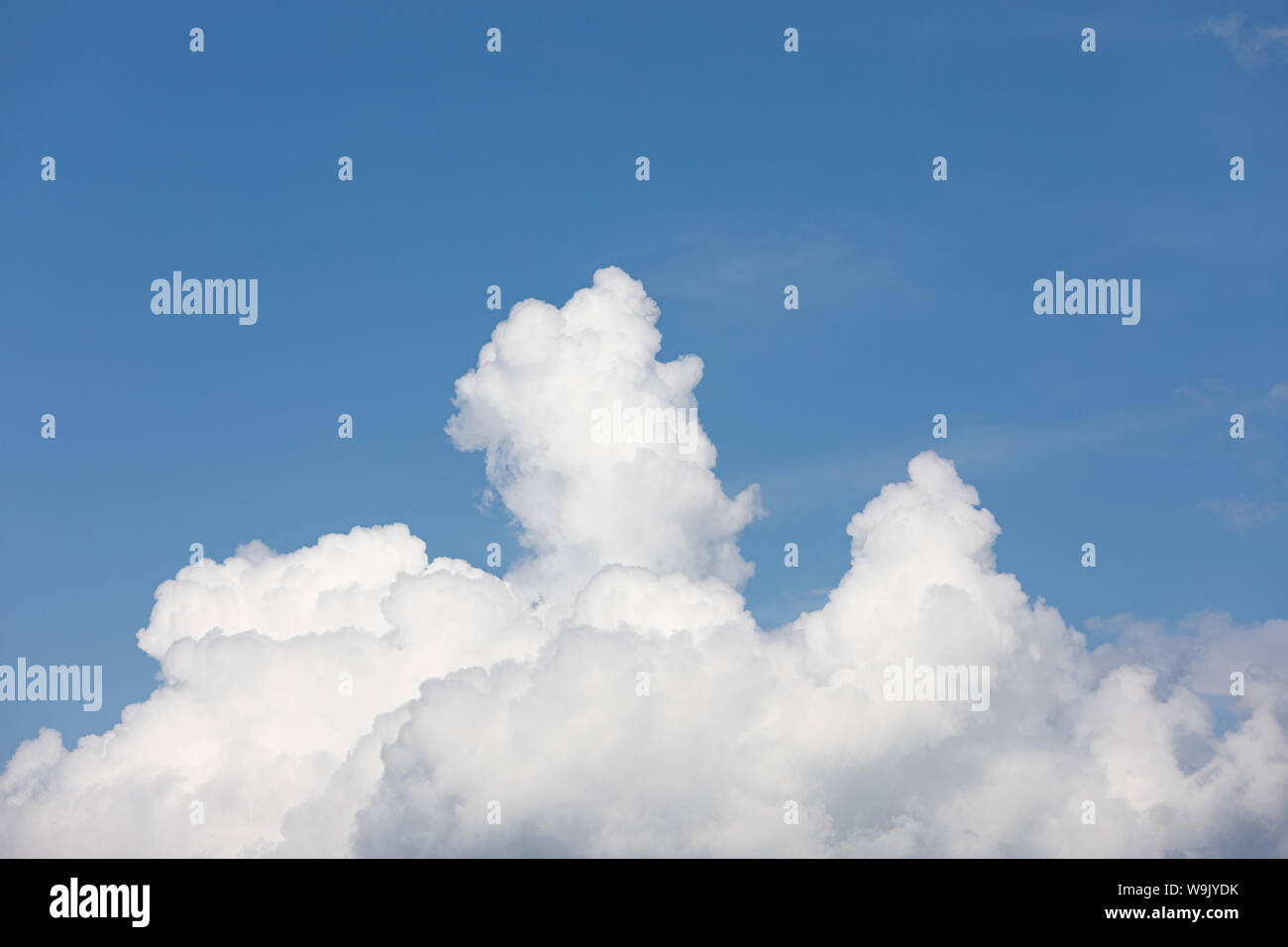 Fluffy cloud edge and blue sky Stock Photo - Alamy