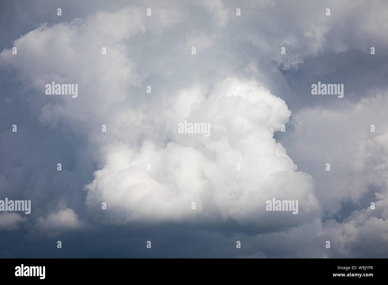 Fluffy cloud edge and blue sky Stock Photo - Alamy