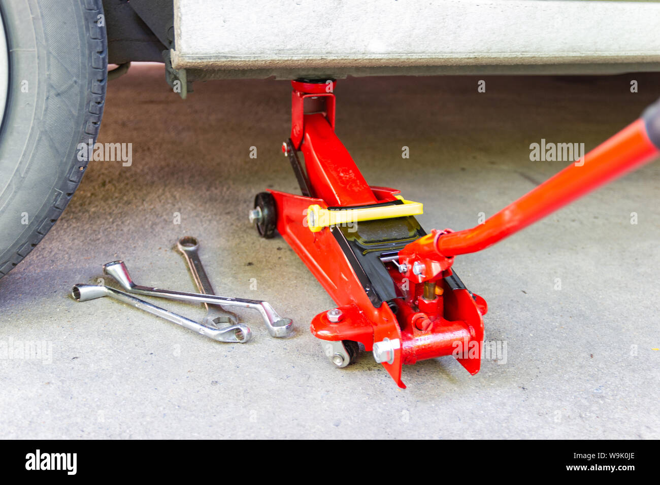 red tool jack lift car for Maintenance and service of cars at Car care ...