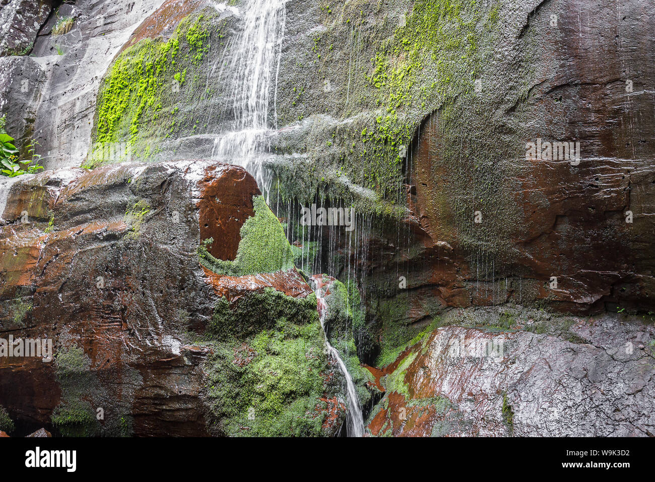 Close up of a beautiful base of long exposure mountain waterfall ...
