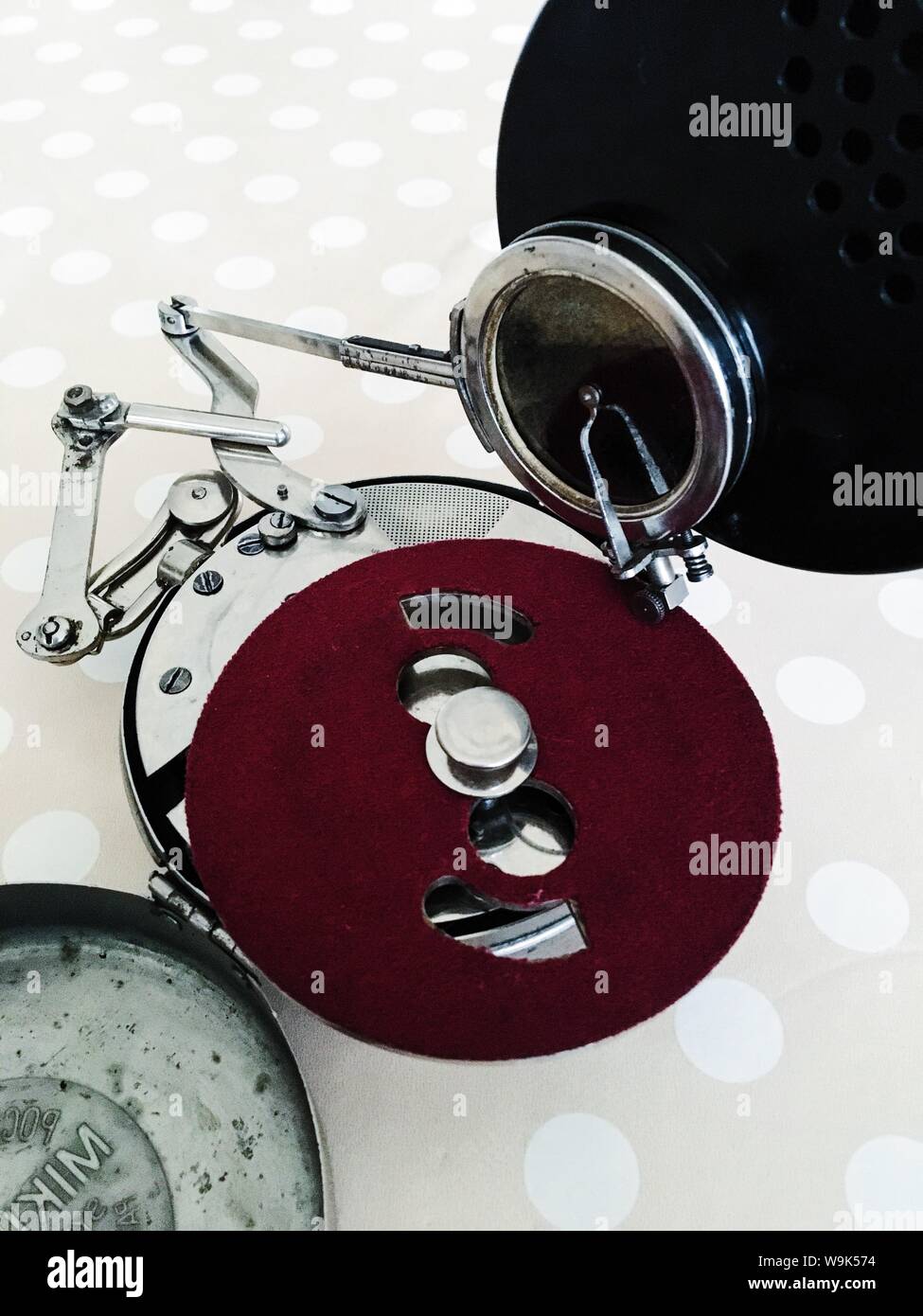 Closeup shot of a pocket phonograph on a light dotted background Stock ...
