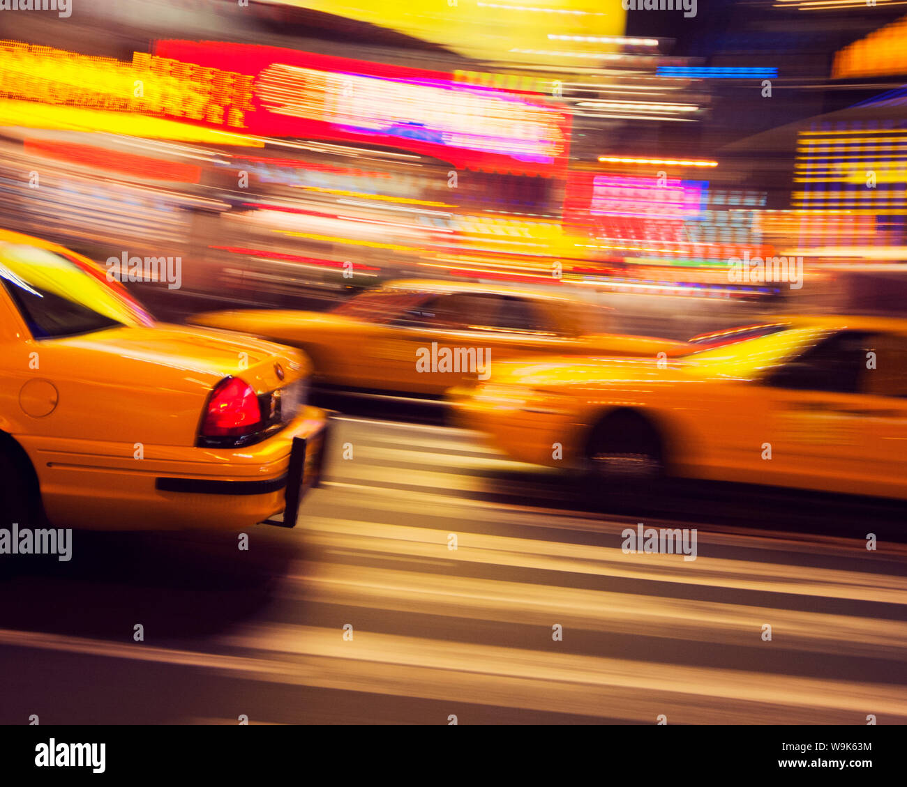 Traditional yellow taxi at night, New York City, United States of ...
