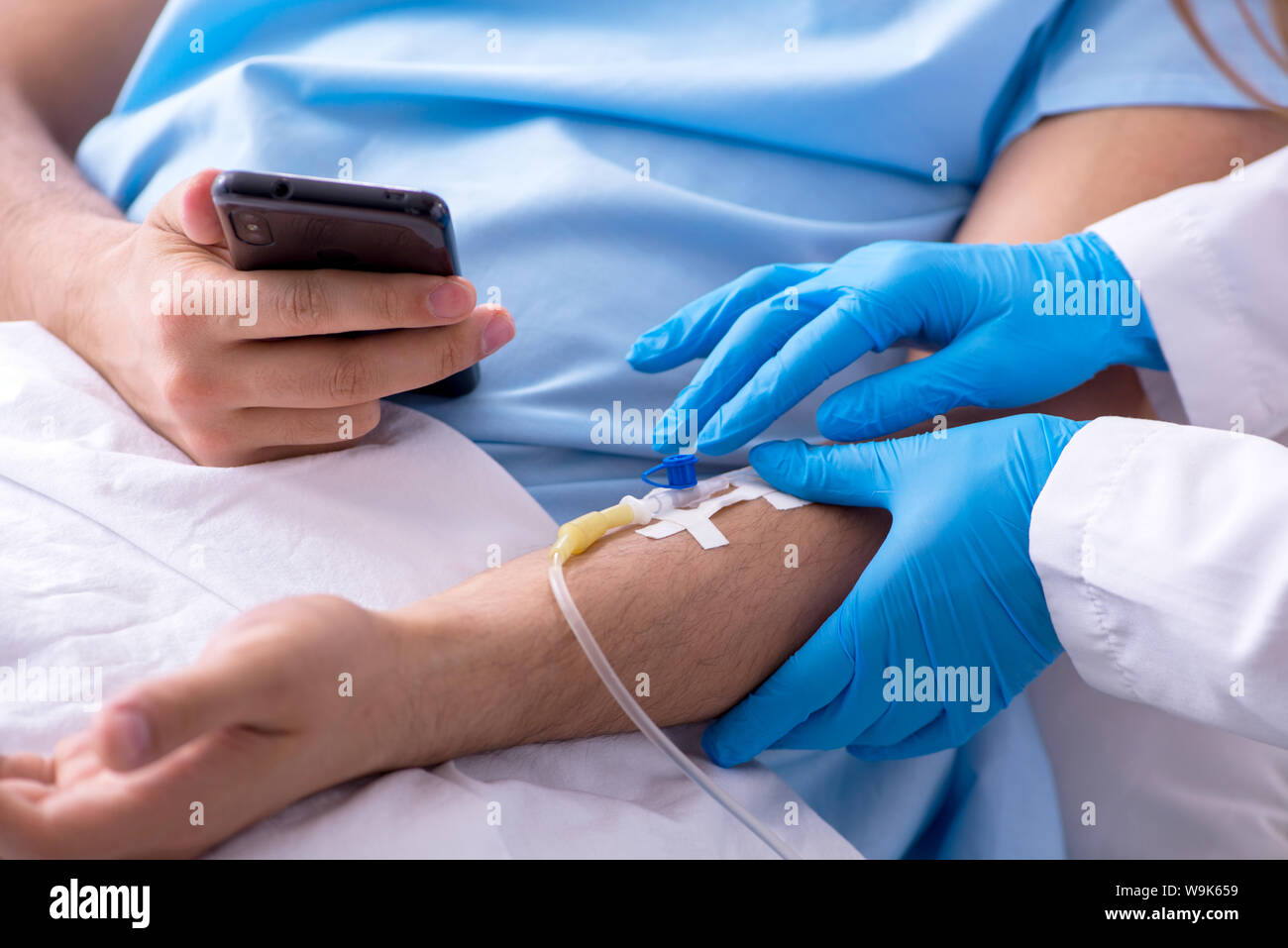 Male patient in blood transfusion concept hi-res stock photography and ...