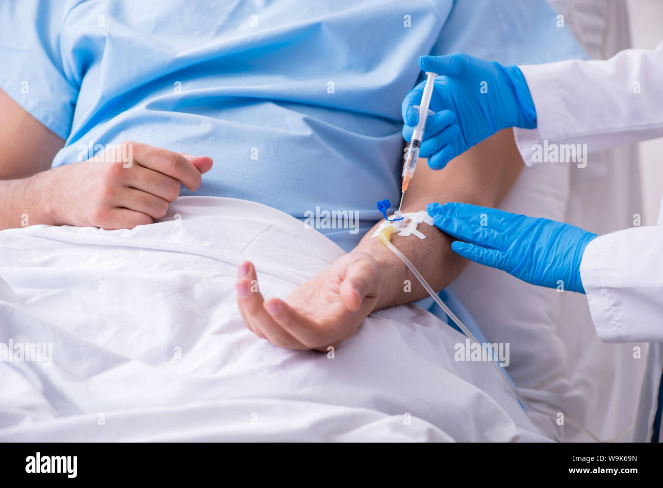 Male patient in blood transfusion concept hi-res stock photography and ...