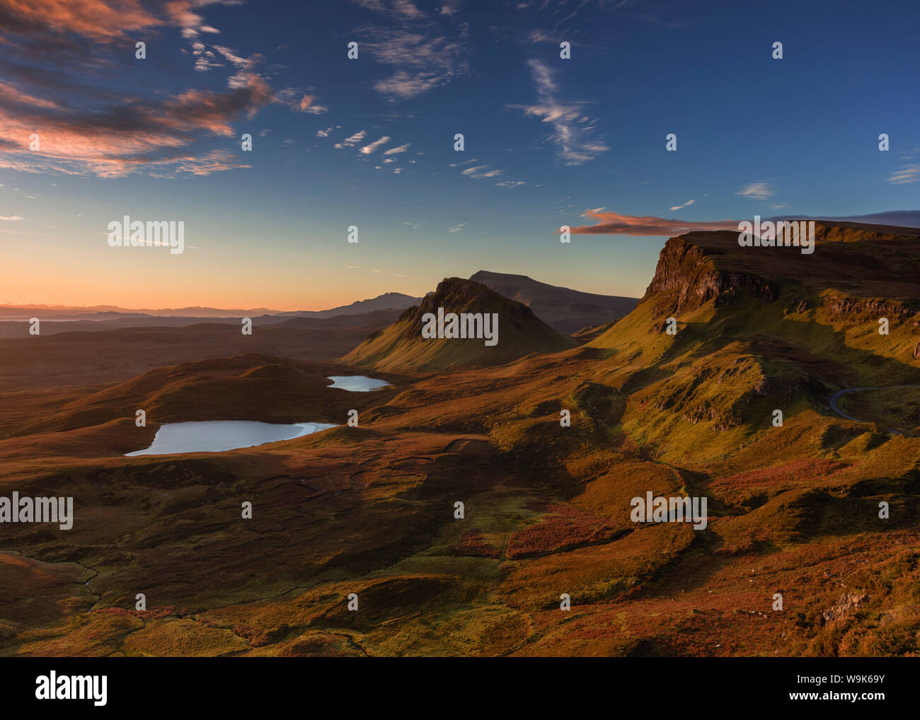 The Trotternish ridge at dawn looking south to the Cleat, and beyond to ...