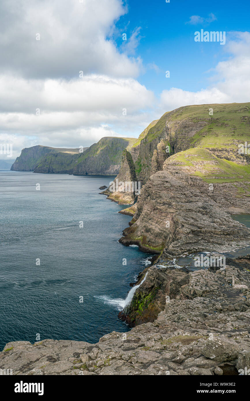 Bosdalafossur waterfall on Vagar island coastline, Faroe Islands Stock ...