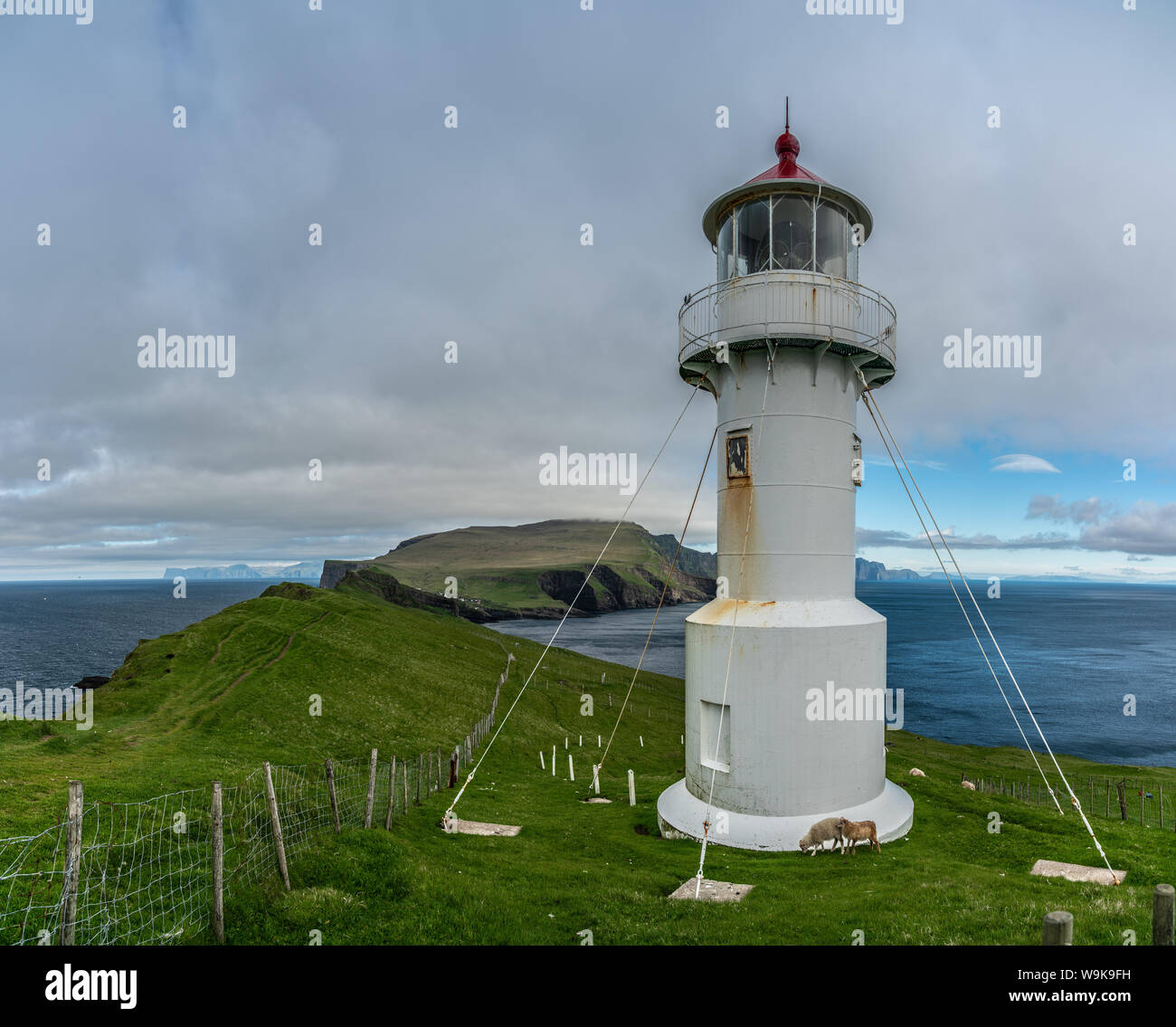 The lighthouse on Mykines island, Faroe Islands Stock Photo - Alamy