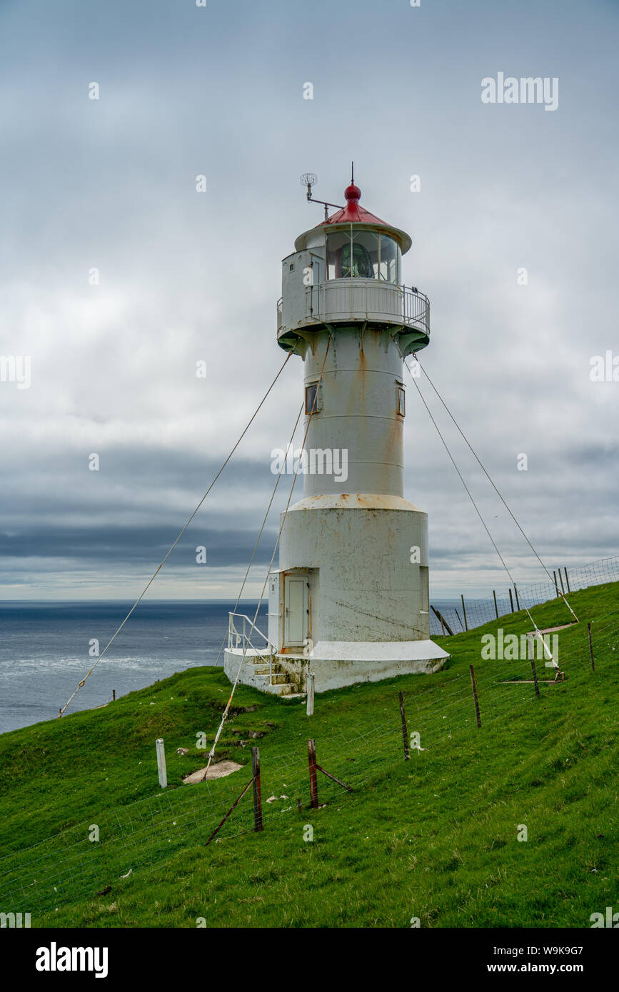 The lighthouse on Mykines island, Faroe Islands Stock Photo - Alamy