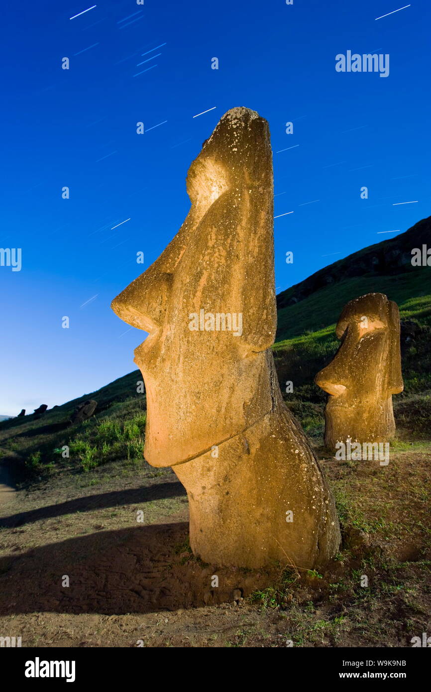 Maoi statues at Rano Raraku, illuminated at dusk, Easter Island (Rapa ...