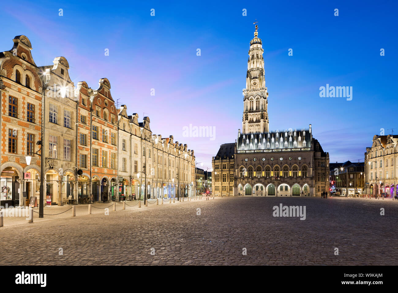 Place des Heros and the Town Hall and belfry floodlit at night, Arras ...