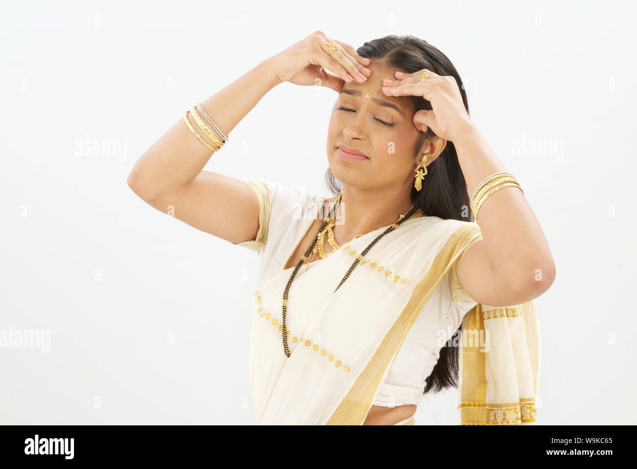 South Indian woman suffering from headache Stock Photo - Alamy