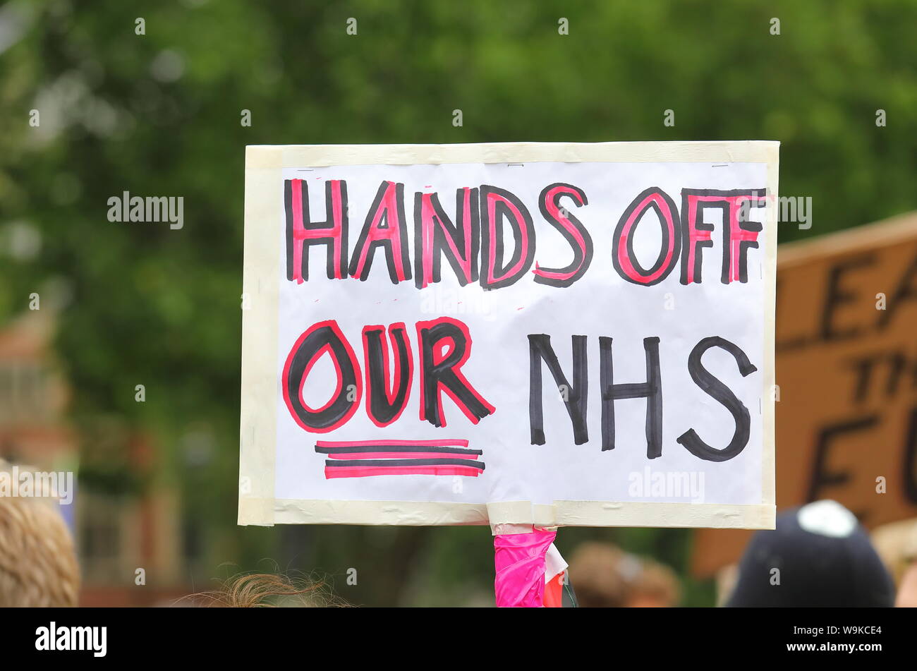 Placard held at Protest against Donald Trump visit and NHS policy in ...