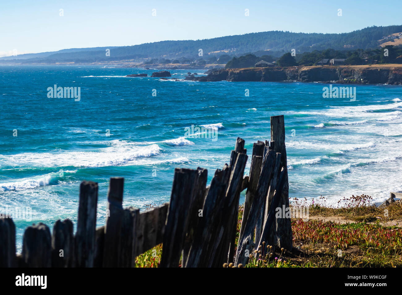 an old fence blocks a cliff edge along the northern california coast ...